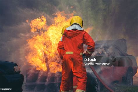 Firefighter Rescue Training In Fire Fighting Extinguisher Firefighter