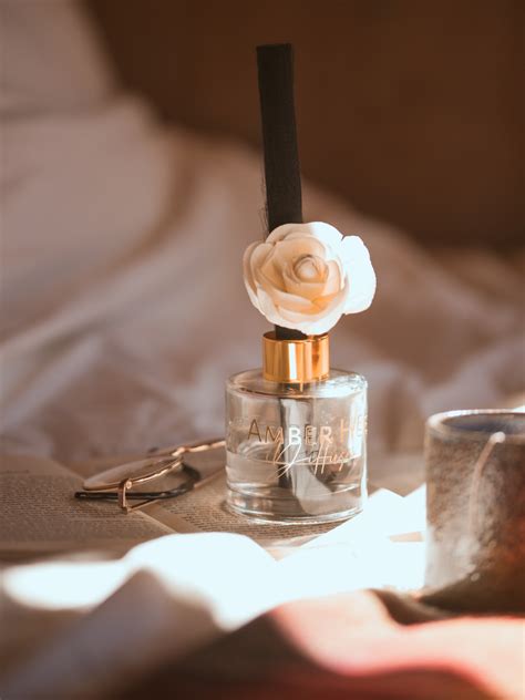 Pear And Freesia Flower Reed Diffuser Amber Hue Candles