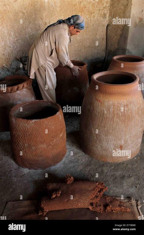 Herat Afghanistan 10th June 2014 An Afghan Man Makes Traditional Oven Tandoor For Bread
