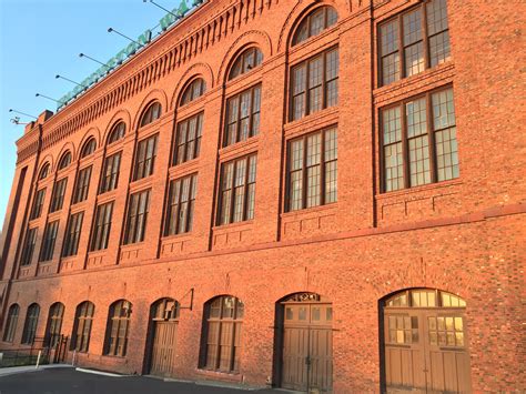 Industrial Red Brick Building With Many Windows