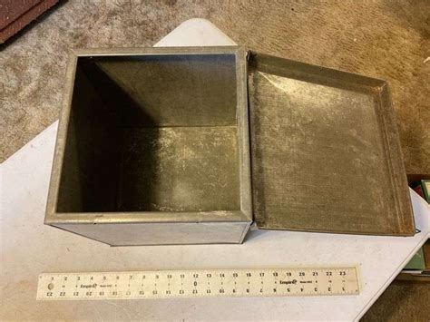 Vintage Cracker Tin Legacy Auction Company