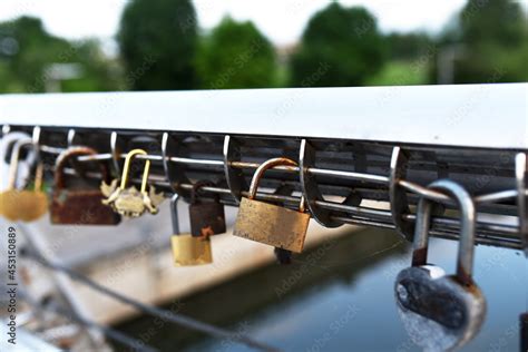 Padlock On Lovers Lock Bridge Husband And Wife During The Wedding Hung