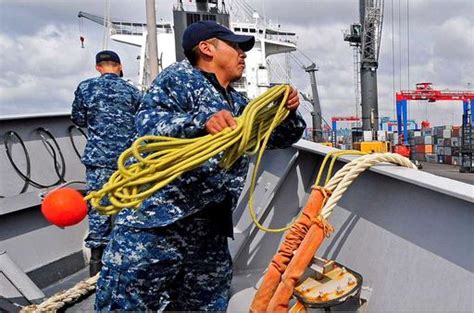 Us Navy Seaman James Aguilar Heaves A Mooring Line As Guided Missile