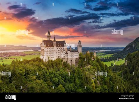 Famous Neuschwanstein Castle With Scenic Mountain Landscape Near Fussen