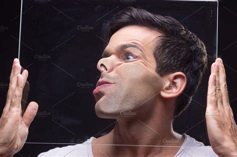 Man Pressed Against Glass Bizarre Featuring Young Adult Bizarre And