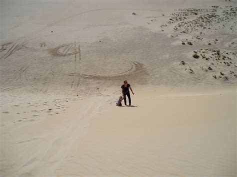 Laurance Of Arobia Sand Sledding
