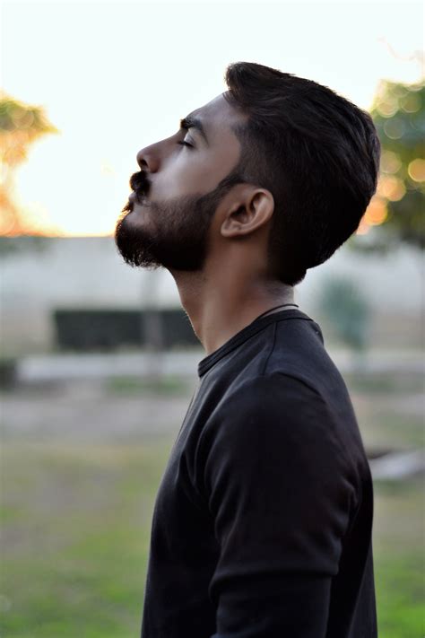 Free Photo Side View Photography Of Man While Closing His Eyes Adult