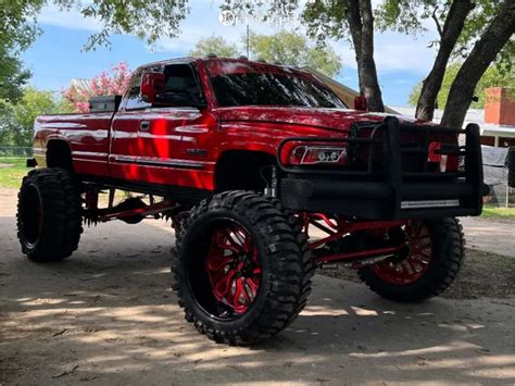 2001 Dodge Ram 2500 With 28x18 117 Grid Gf17 And 44 19 5r28 Interco Super Swamper Bogger And