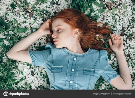 Girl Laying In Field