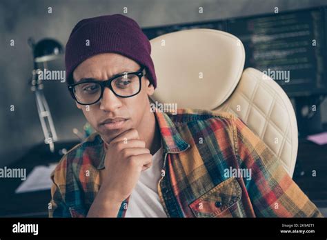 Photo Of Ponder Pensive Freelancer Wear Hat Glasses Thinking Code