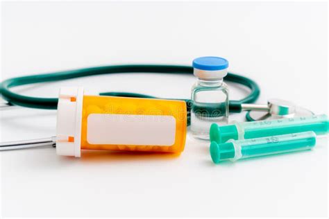 Medical Stethoscope And A Vial Syringes And Packaging With Pills
