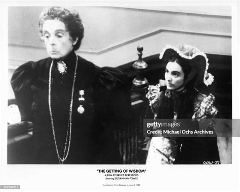 Sheila Helpmann Walks Upstairs As Kim Deacon Follows In A Scene From