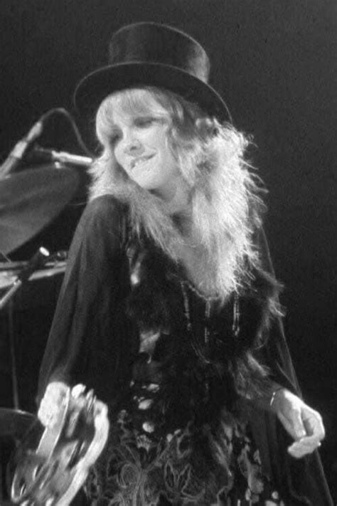 24 Candid Photographs Of Stevie Nicks On Stage With Her Trademark Top
