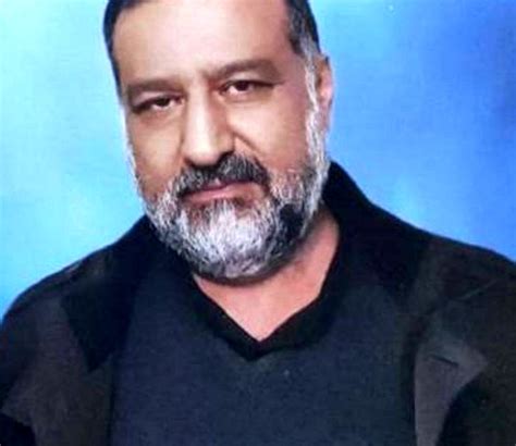 تصویری از شهید سید رضی موسوی در کنار سردار سلیمانی عکس