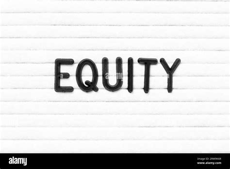 Black Color Letter In Word Equity On White Felt Board Background Stock