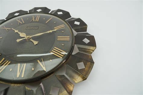 Mid Century Modern Sunburst Wall Clock By Richter Quarz In Brass 1960s