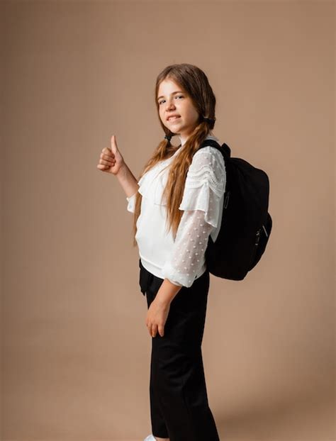 Premium Photo Attractive Girl 12 Years Old On A Studio Background