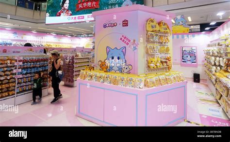 Customers Purchase Cartoon Goods Products Featuring The Miniso