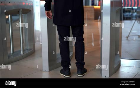 Businessman Entering Office Building Trough Security Gates Media Man