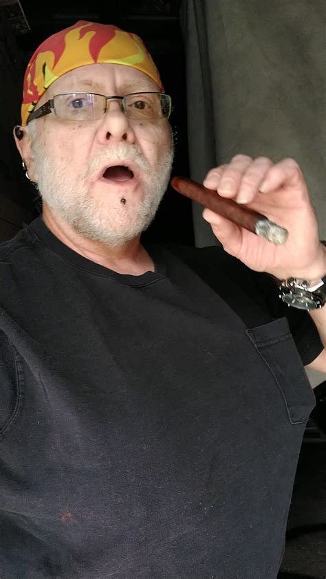 Leather Biker Gena Smoking A Cigar After Riding Leather Biker Gena Smoking A Cigar After Riding