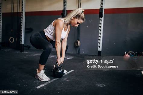 Girl Lifting Weights Photos And Premium High Res Pictures Getty Images