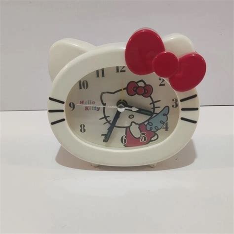 خرید و قیمت ساعت رومیزی طرح کیتی سفید پاپیون دارزنگ خور هدیه ای بسیار شیک برای عزیزانتان ترب