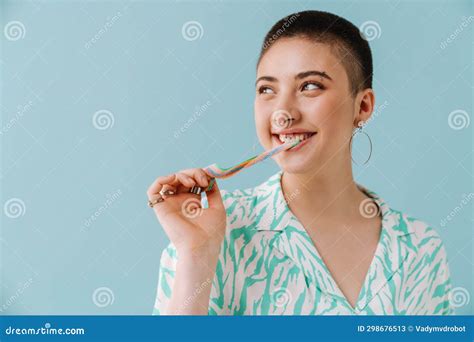 Young Woman Wearing Shirt Smiling And Eating Candy Gummy Stock Image