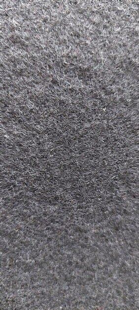 Premium Photo A Grey Piece Of Fabric With A Small White Dot On It