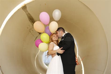 Groom And Bride Kissing In A Big Pipe Stock Image Image Of Outdoor