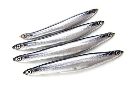 Four Silver Fish Are Shown With One Being Cut Off Premium Ai