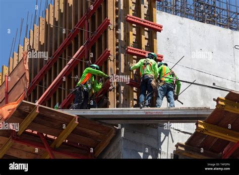 Construction Worker On Scaffolding On A High Rise Building San Jose