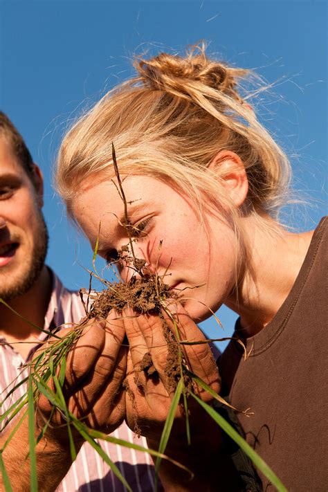 Woman Smelling Grass In Witzenhausen License Image 10301425