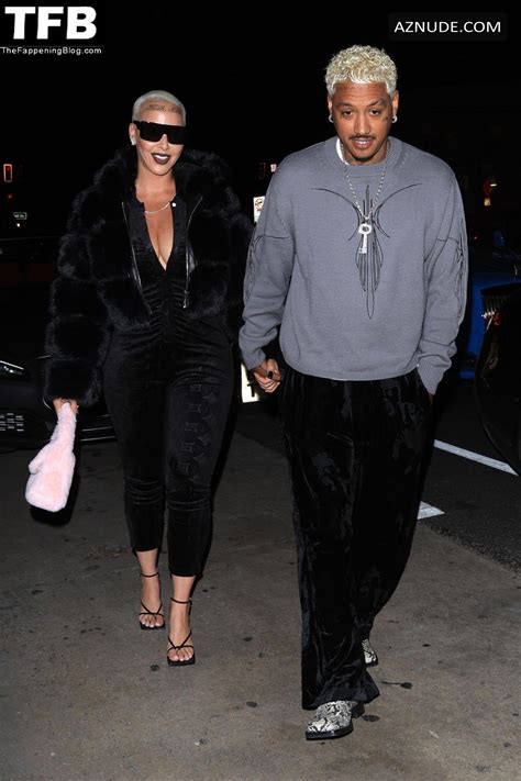 Amber Rose Sexy Seen Flaunting Her Hot Cleavage At Giorgio Baldi In