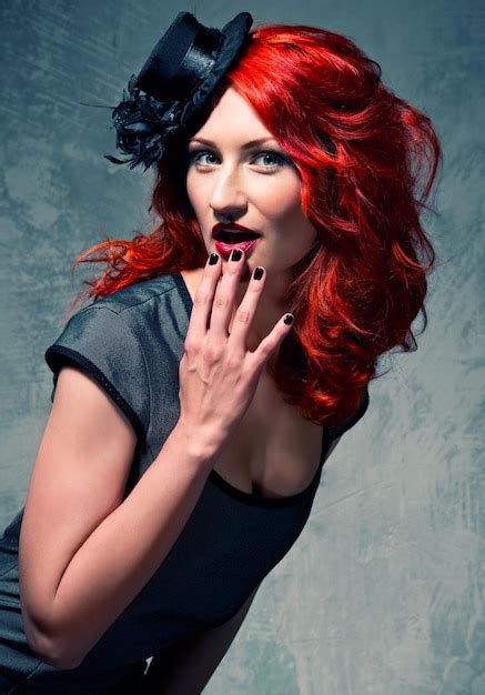 Premium Photo Portrait Of Young Redhead Woman Standing Against Wall
