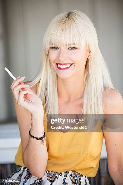 Beautiful Women Smoking Cigarette Photos And Premium High Res Pictures