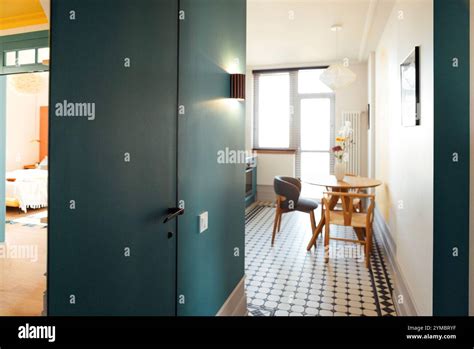 Stylish Modern Interior Of The Hallway Blue Walls A Mirror And
