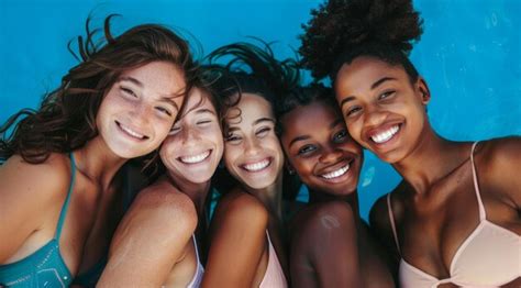 Premium Photo A Group Of Pretty And Attractive Diverse Young Women Are Smiling For A Photo In