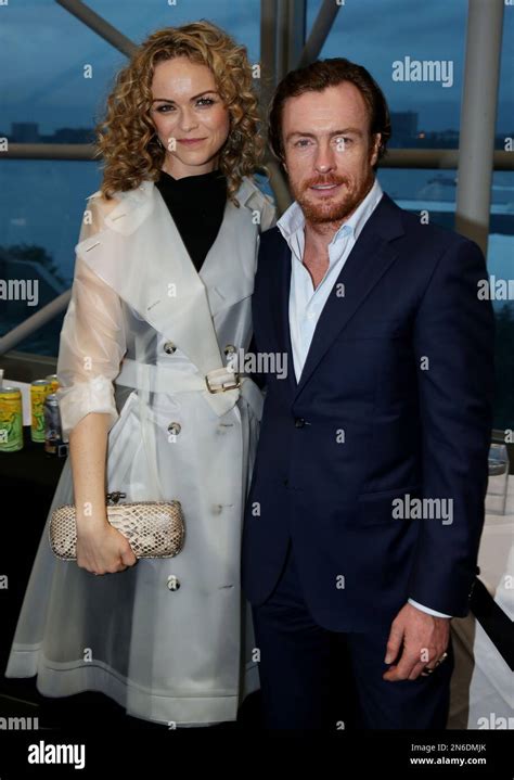 Toby Stephens Right And Anna Louise Plowman Pose Together Before The