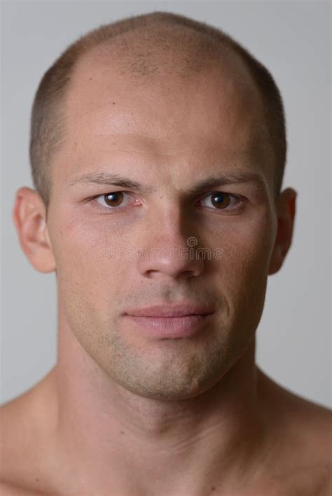 Face Of Happy Young Muscular Bald Man With Eyeglasses Shirtless Stock