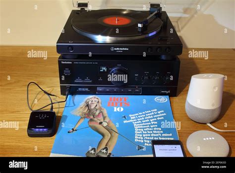 Vinyl Record Player And Analogue Amplifier Links To Digital Smart