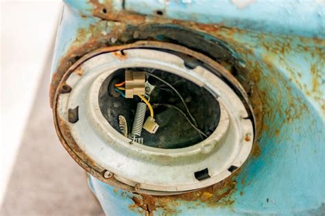 High Angle View Of Rusty Broken Headlight Premium Photo