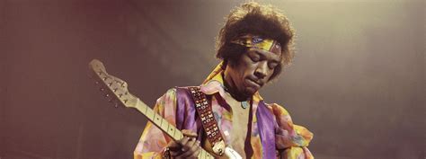 Jimi Hendrix Playing Guitar Behind His Back
