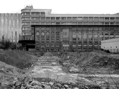 Premium Photo Building In Front Of Field