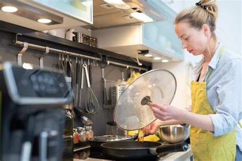 Premium Photo Woman Working In Kitchen