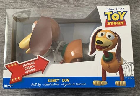 Disney Pixar Toy Story Slinky Dog Pull Toy New And Sealed £2299