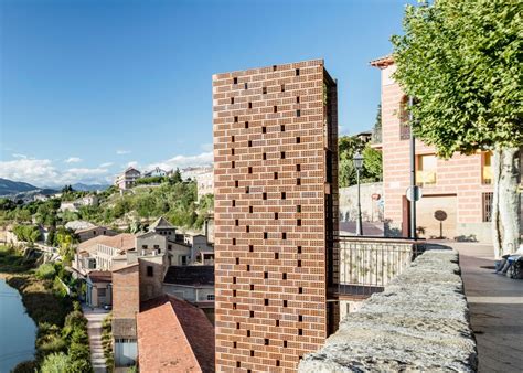 Perforated Brick Elevator Connects Medieval Town To Riverside