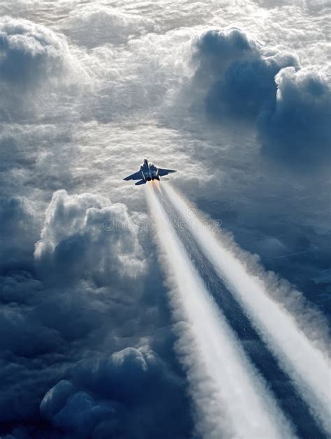 Jet Fighter Maneuvers Through Dramatic Clouds Leaving Vapor Trails In A