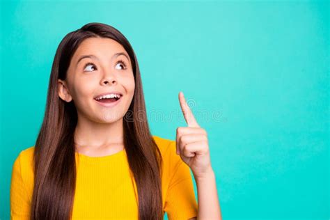 Photo Portrait Of Amazed Girl Pointing Finger Up Isolated On Vivid