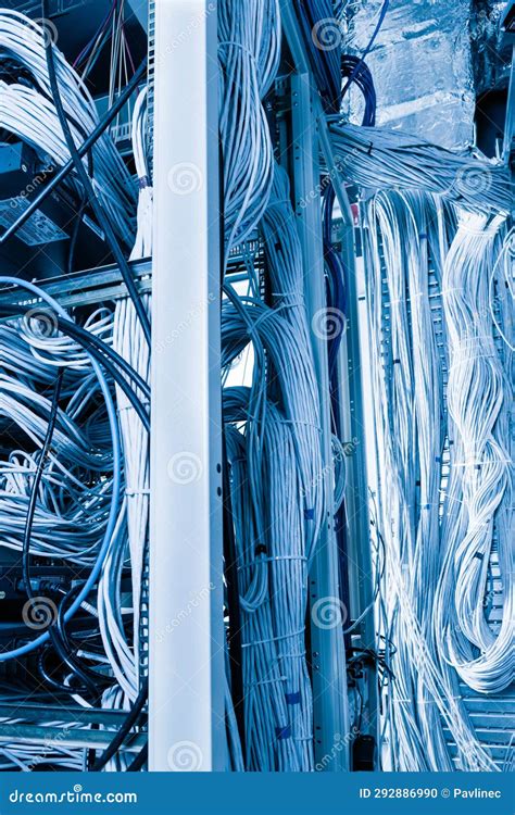 Bunch Of Network Cables In Wave Pattern Leading Across Server Ro Stock
