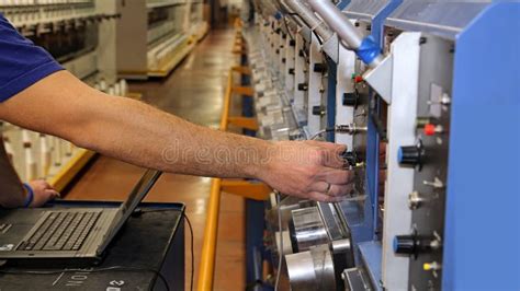 Checking Computerized Machine Status With Laptop Computer Stock Image